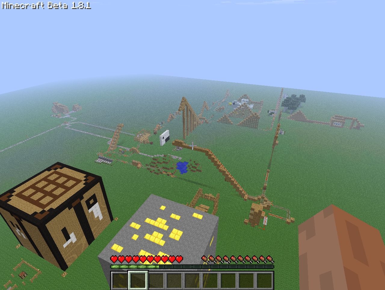 map with giant blocks tnt ,workbench ores,and a roller coaster Minecraft Map