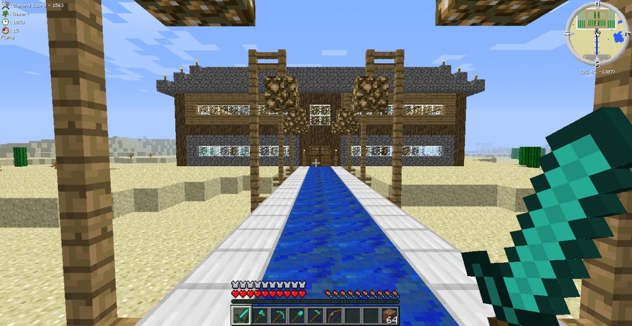 desert house next to NPC village Minecraft Map
