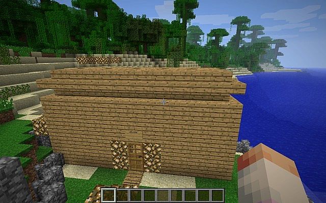small house next to water Minecraft Map